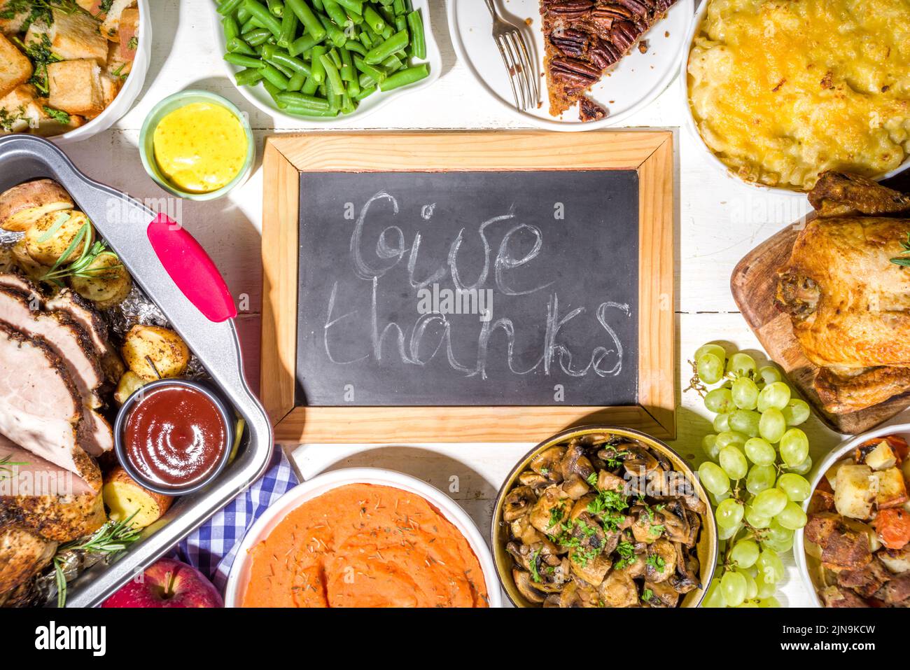 Thanksgiving dinner table with new traditional thanksgiving food ...