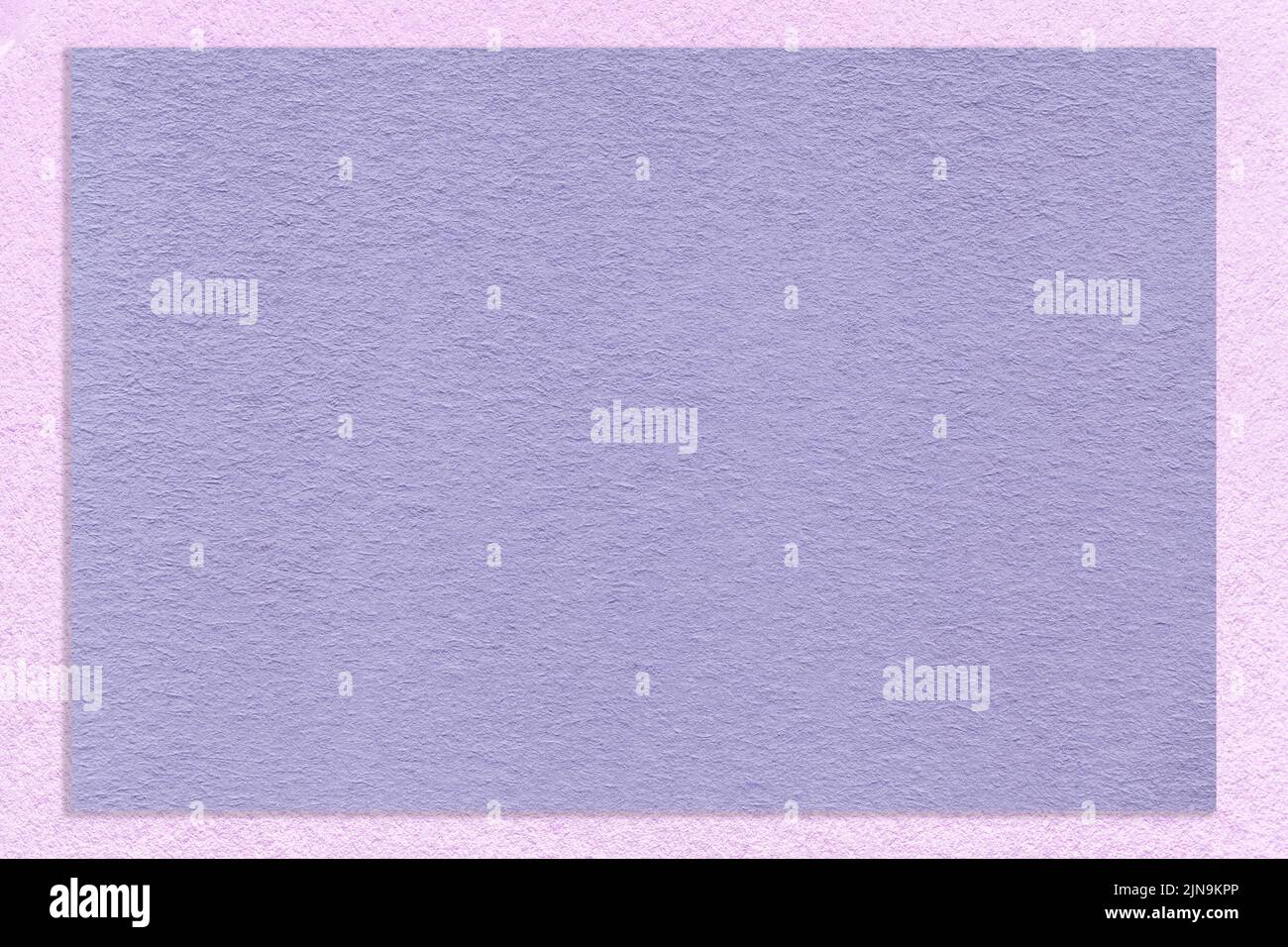 Texture of craft very peri paper background with pink border, macro ...