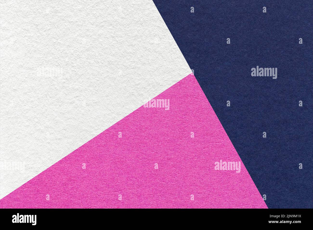 Texture of craft navy blue, white and magenta shade color paper ...