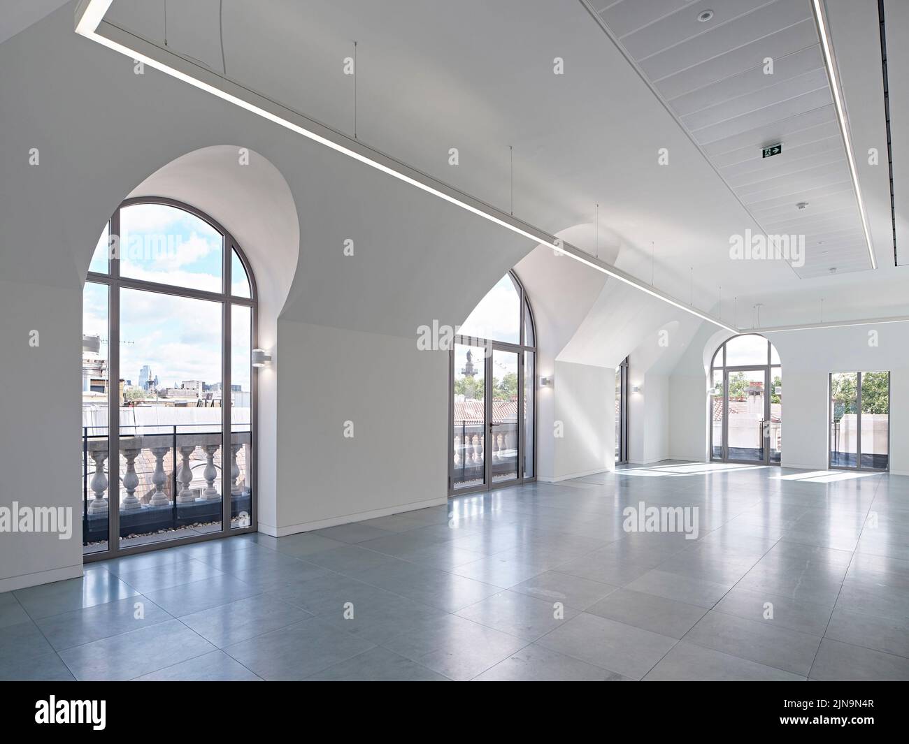 Unfurnished upper floor with arched windows and city view. 30 St James ...