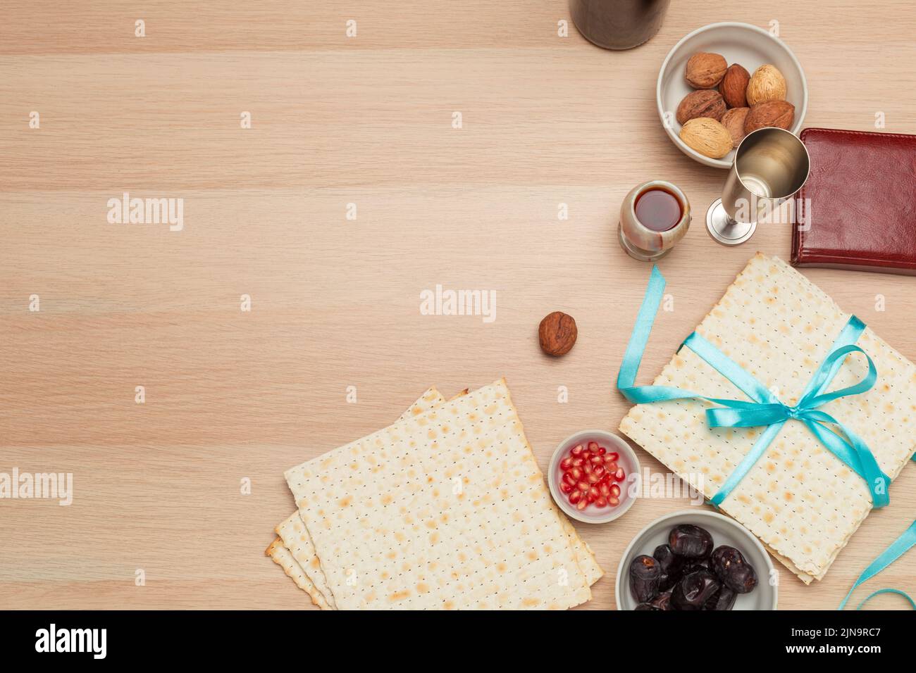 Jewish holiday Passover banner design with wine, matzo on wooden ...