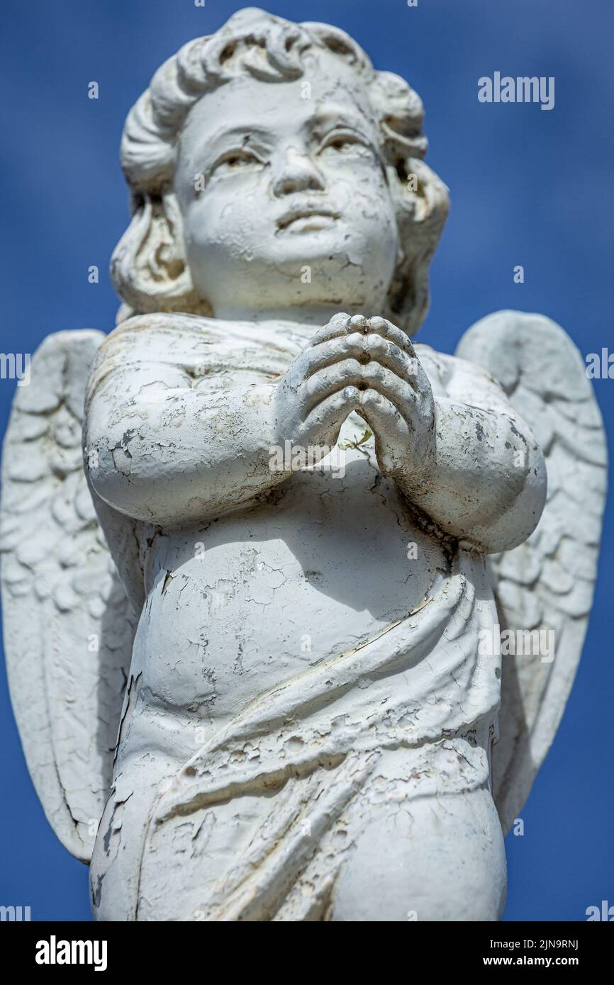 Praying hands memorial hi-res stock photography and images - Alamy