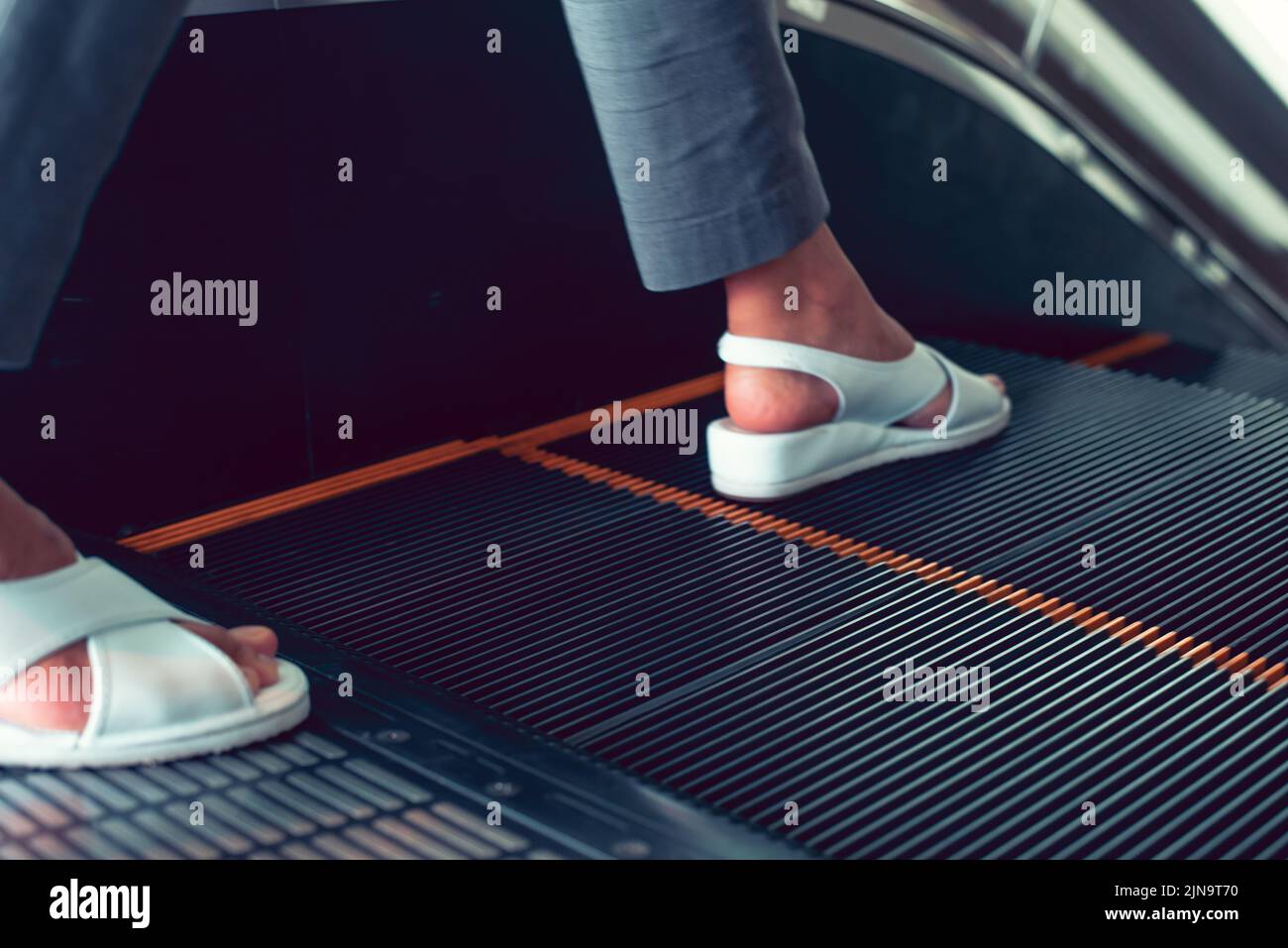 Woman stepping on step hi-res stock photography and images - Alamy