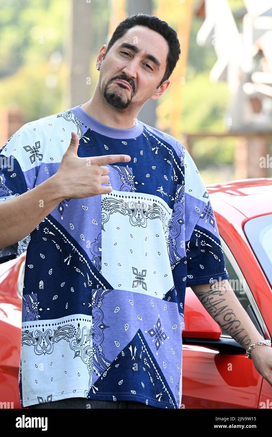 Cologne, Germany. 10th Aug, 2022. Rapper Eko Fresh stands in the harbor ...