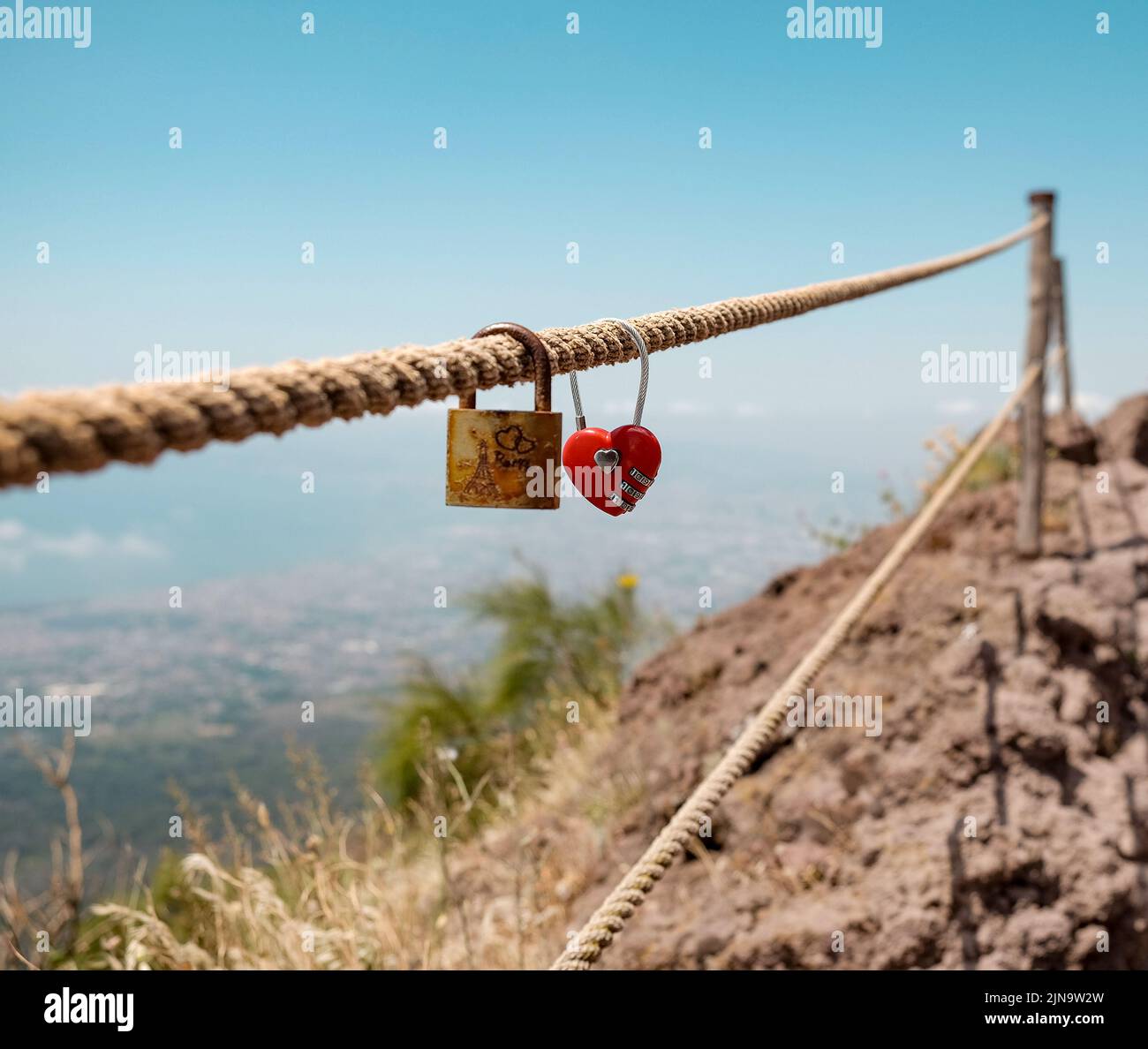 Love locked padlocks on the rope protecting you from the drop at Mount ...