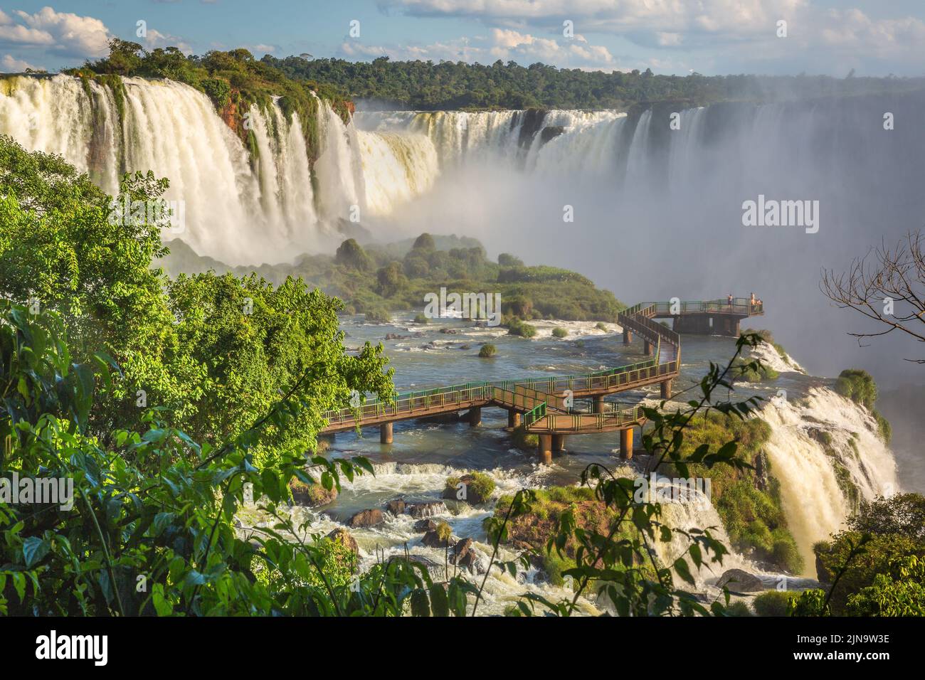 Iguacu falls in southern Brazil at sunset with catwalk footbridge Stock ...