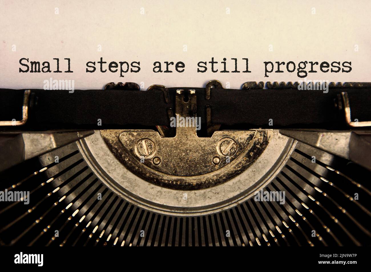 Small steps are still progress text typed on an old vintage typewriter ...
