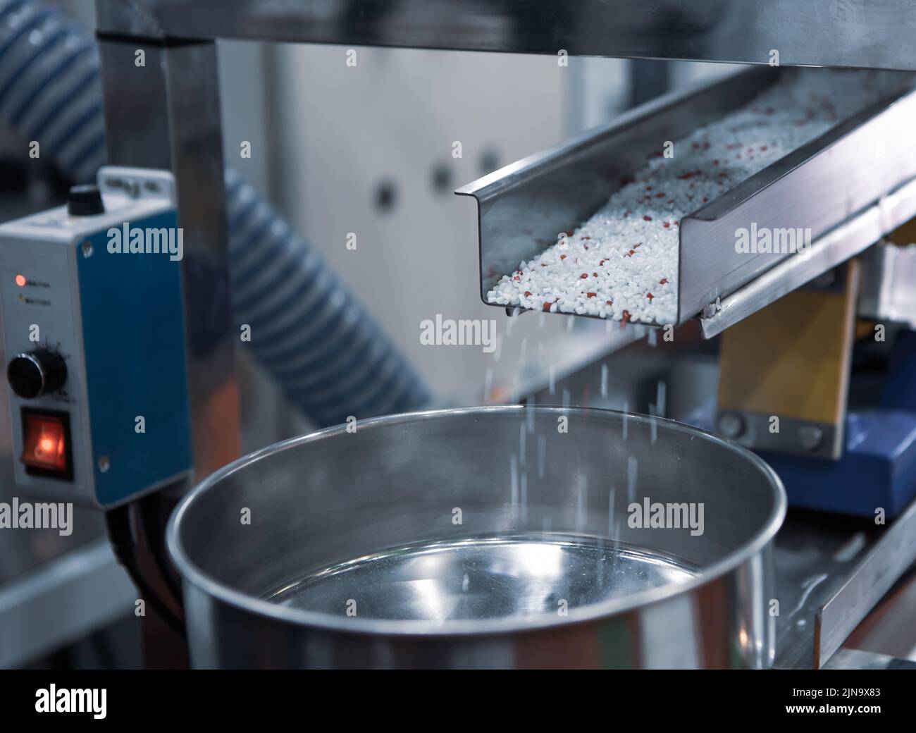 Metal detector and separator in manufacture industry Stock Photo - Alamy
