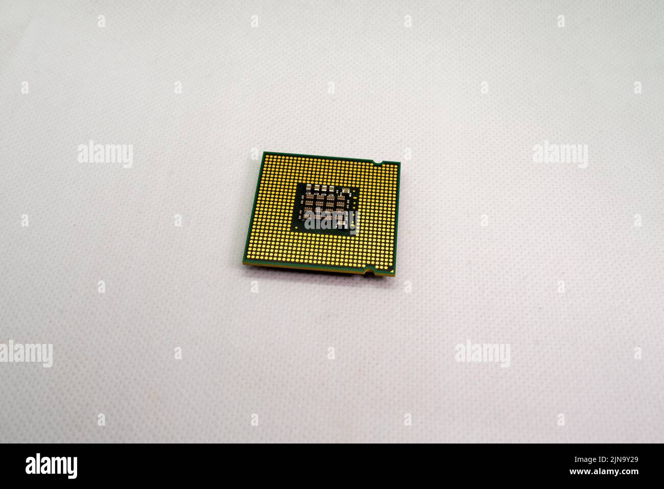 close up of a cpu chip,Isolated modern CPU with it s pins up Stock ...