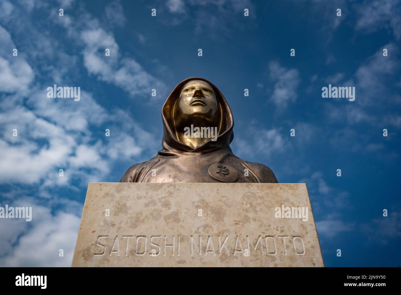 Budapest, Hungary -August 7, .2022: Portrait of the statue of Satoshi ...