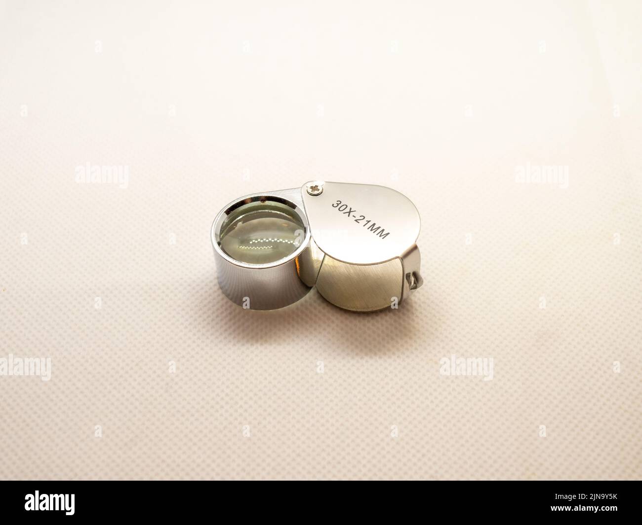 Reading magnifying glass hi-res stock photography and images - Alamy