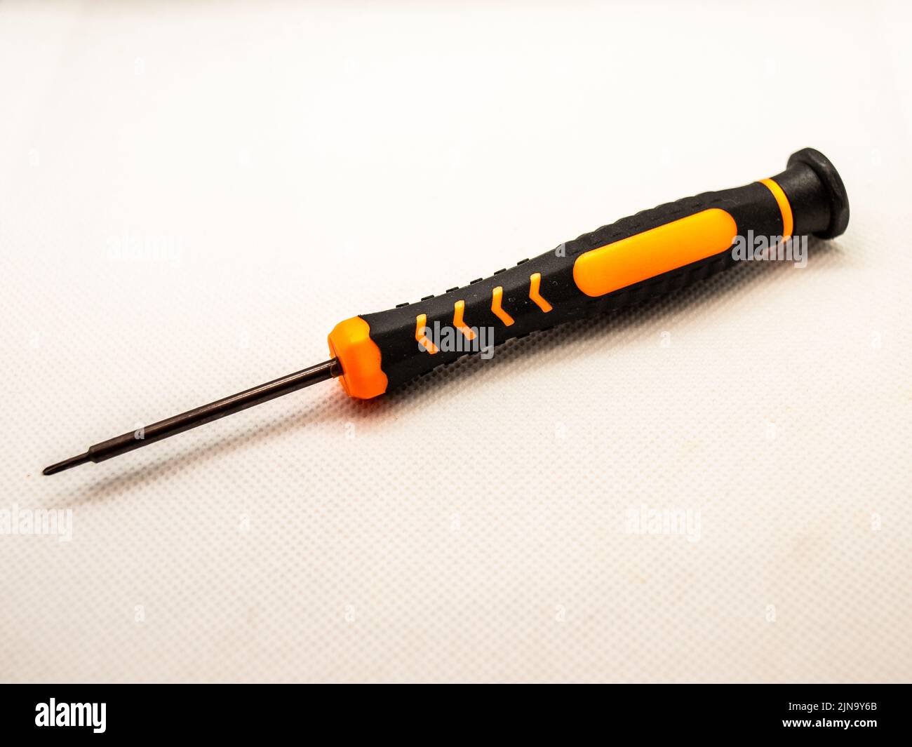 Black screwdriver isolated on white background Stock Photo - Alamy