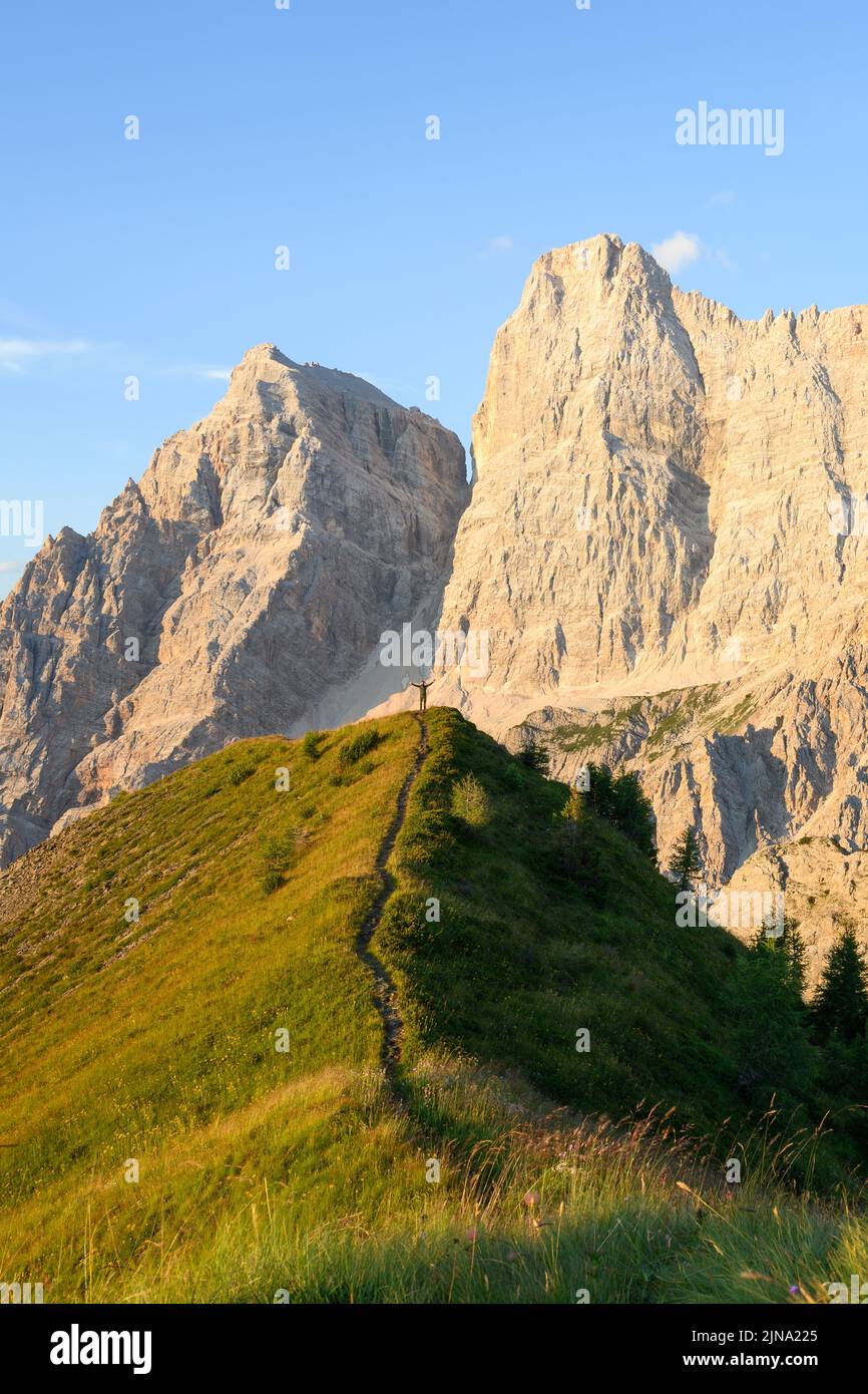 Stunning view of a person enjoying the view of Monte Pelmo from the ...