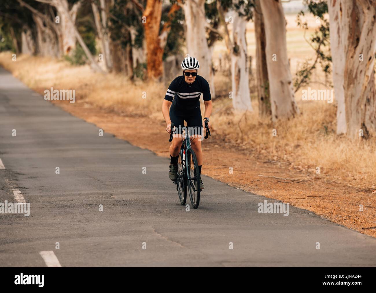 Professional female cyclist outdoors hi-res stock photography and ...