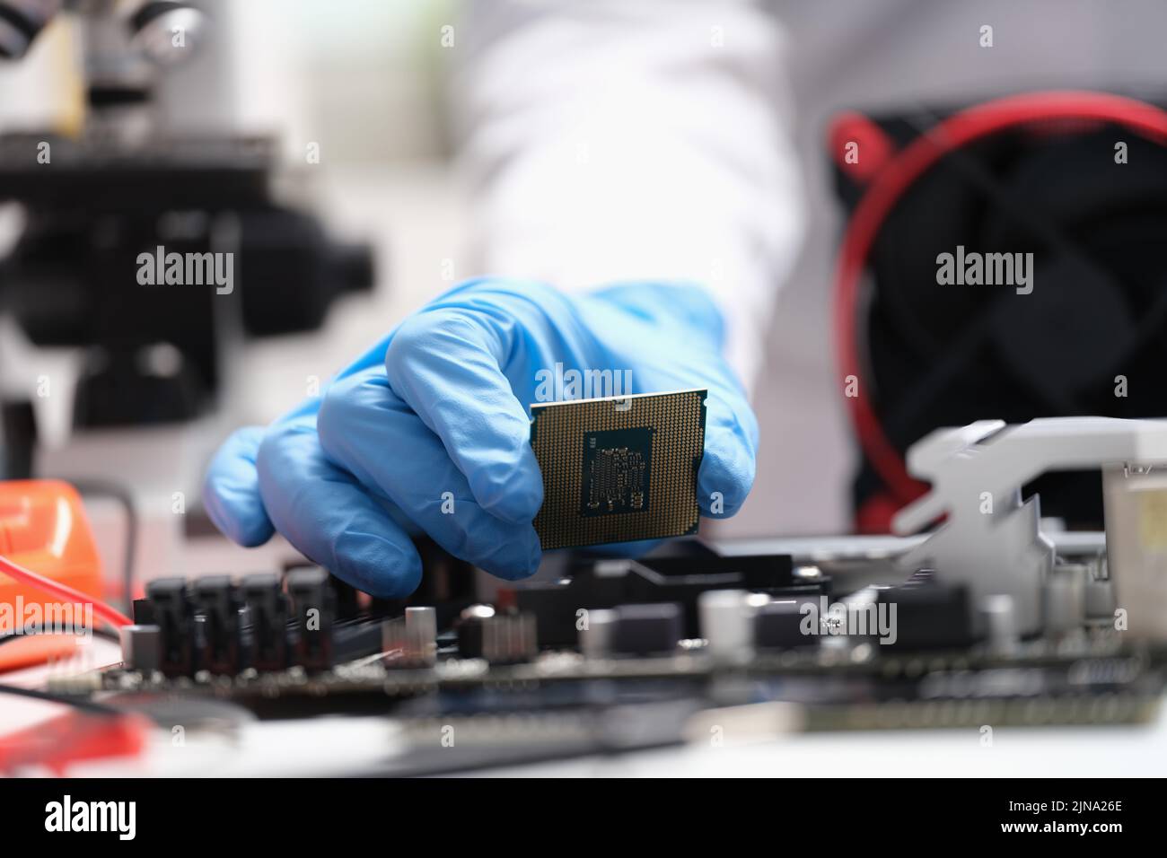 Installing modern central processor unit into motherboard Stock Photo ...