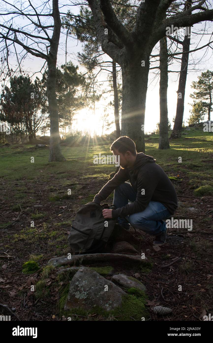 Man backpack sun hi-res stock photography and images - Alamy