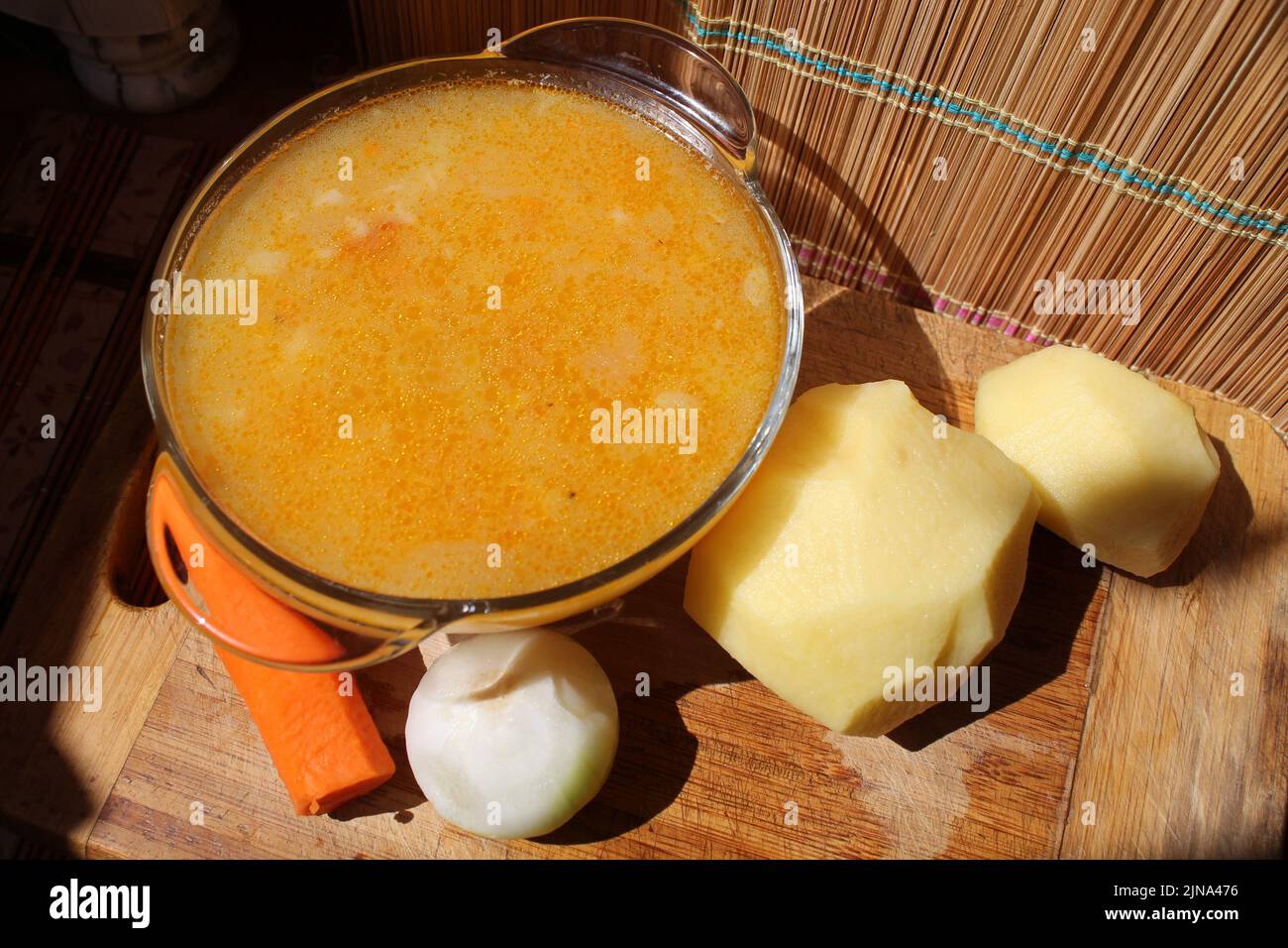 appetizing healthy soup from mushroom and vegetables in glass bowl on ...