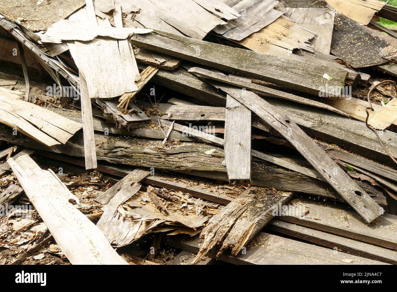 A pile of various construction debris, boards, stones, background ...