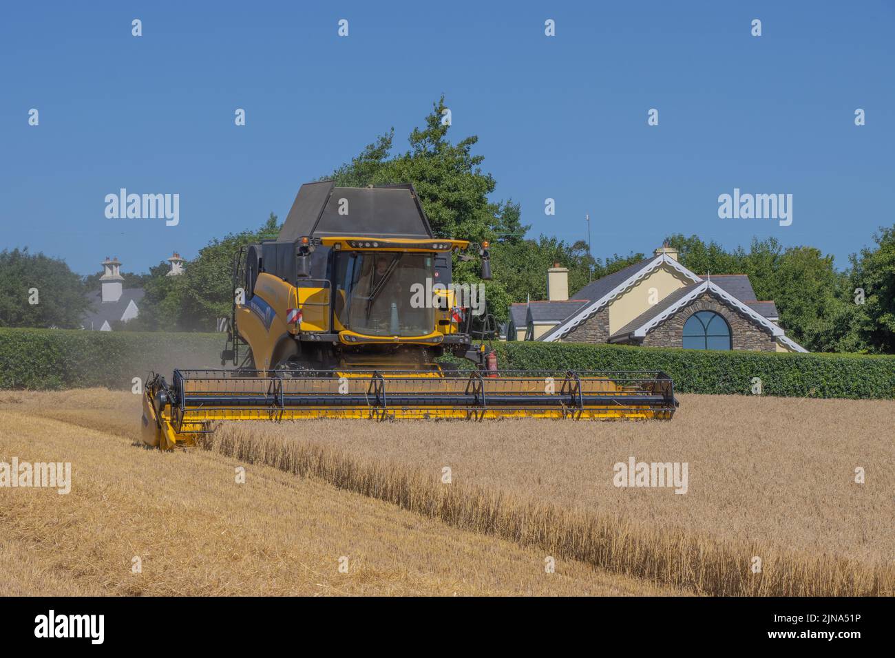 New Holland Track Combine Harvester Stock Photo - Alamy