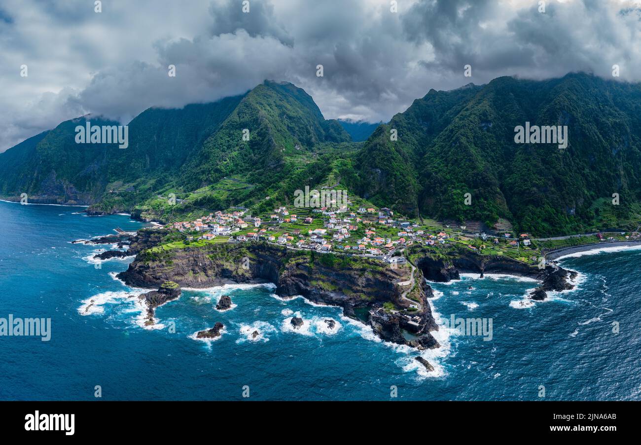 Aerial view of coastal village, Seixal, Porto Moniz, Madeira, Portugal ...