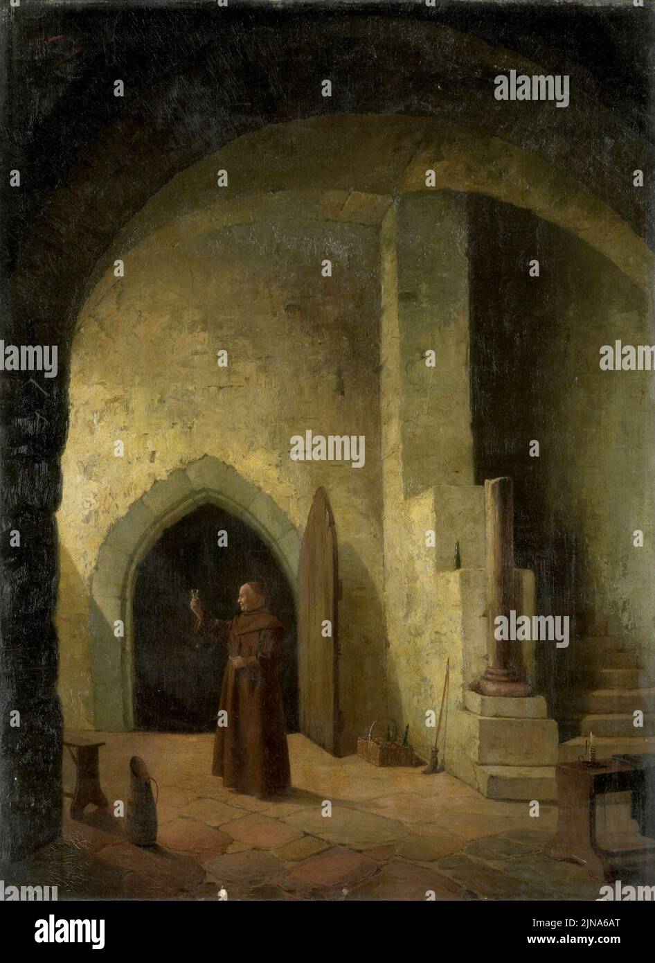 Een monnik met een glas in de hand in een kelder Stock Photo - Alamy