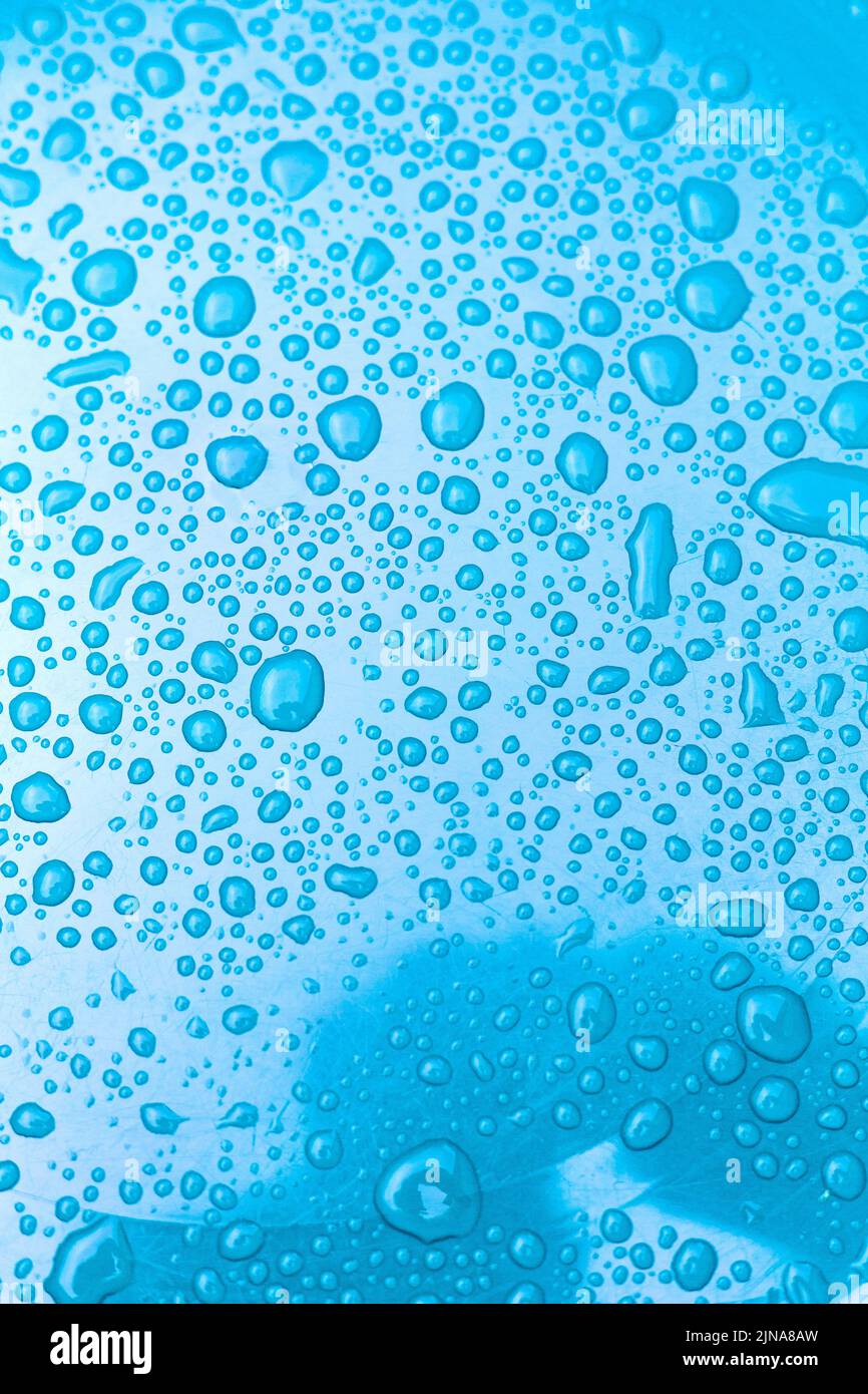 Abstract texture with water drops after rain. Blue background. Mockup ...