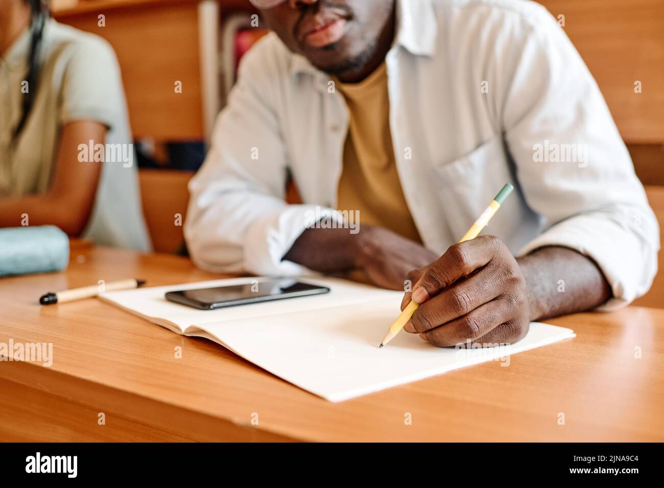 Black student exam desk hi-res stock photography and images - Alamy