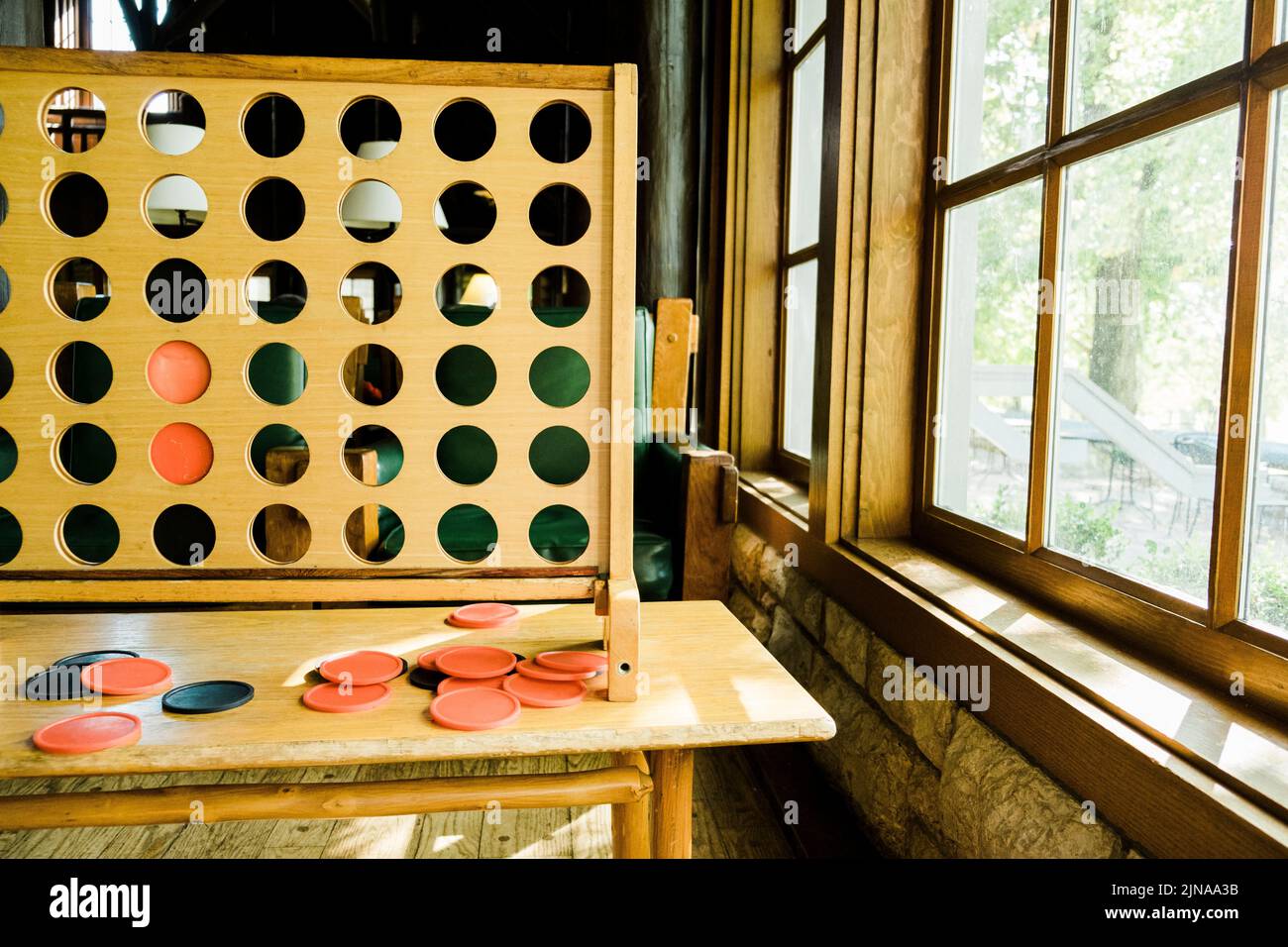 A shot of a wooden board game "line up Stock Photo - Alamy