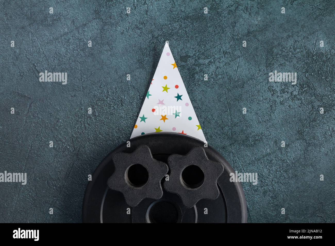 Dumbbell weight plate with cone shaped hat. Gym exercise equipment as ...