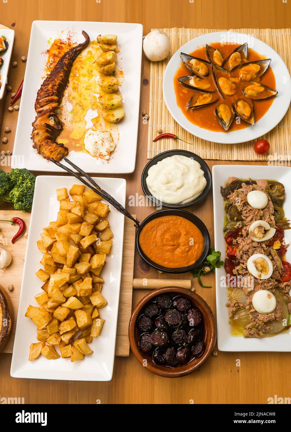 Table with typical Spanish food Stock Photo - Alamy
