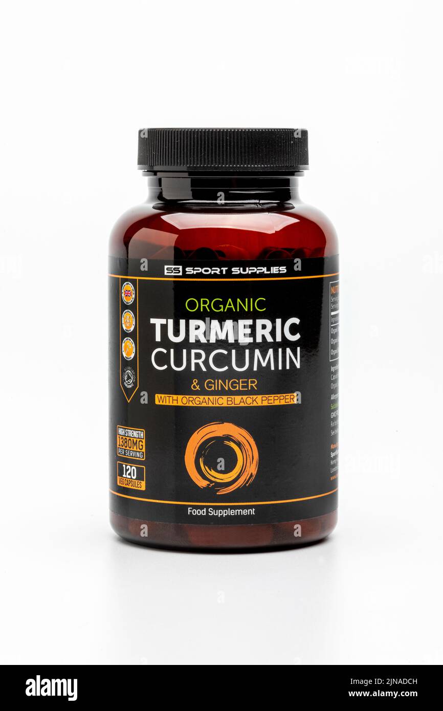 A bottle of Turmeric capsules Stock Photo - Alamy