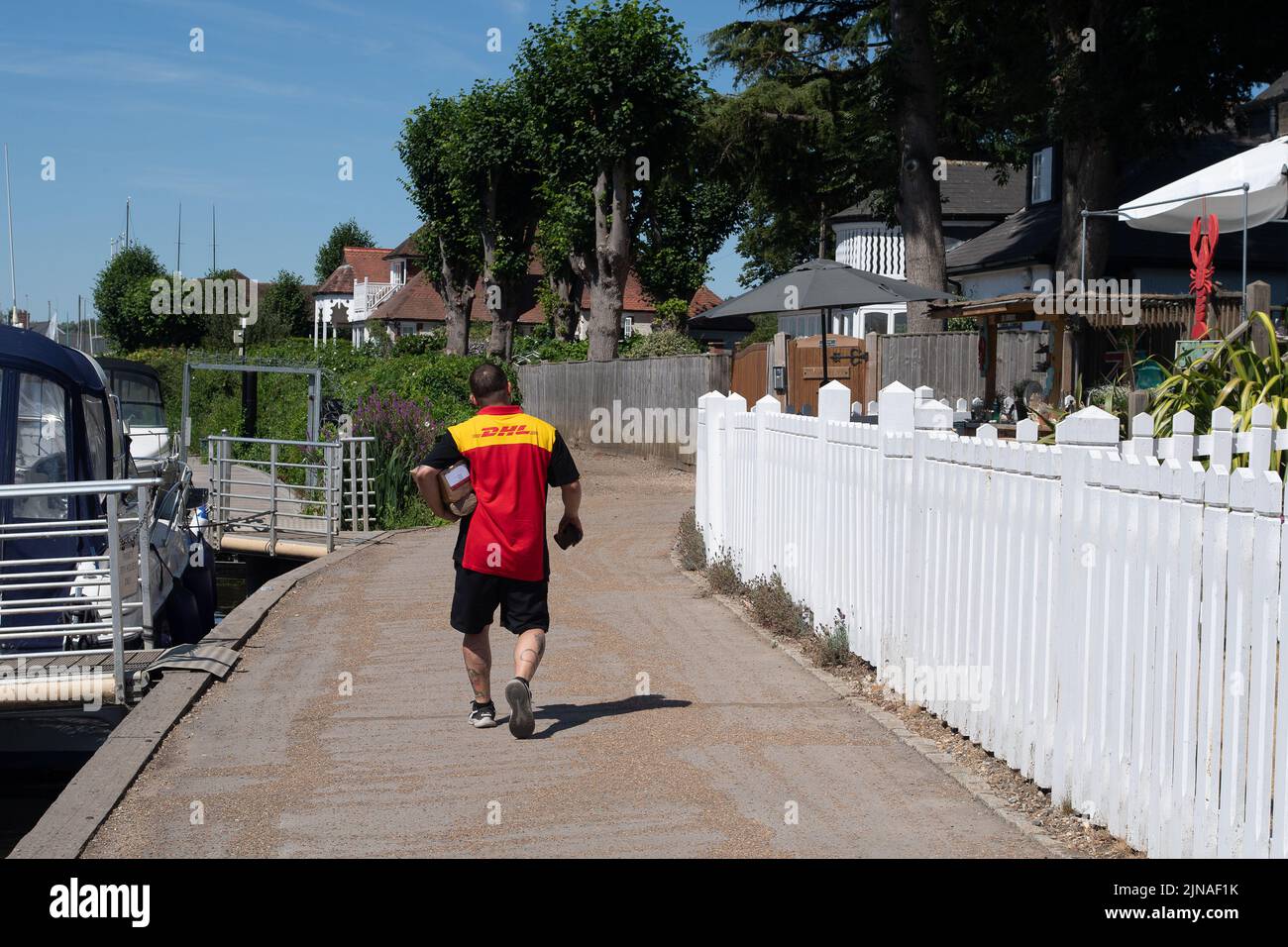 Dhl delivery man hi-res stock photography and images - Alamy