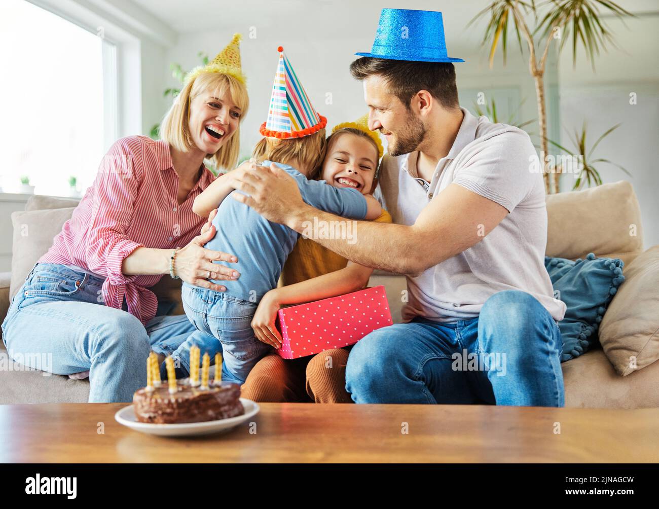 child family birthday celebration party cake father happy mother ...