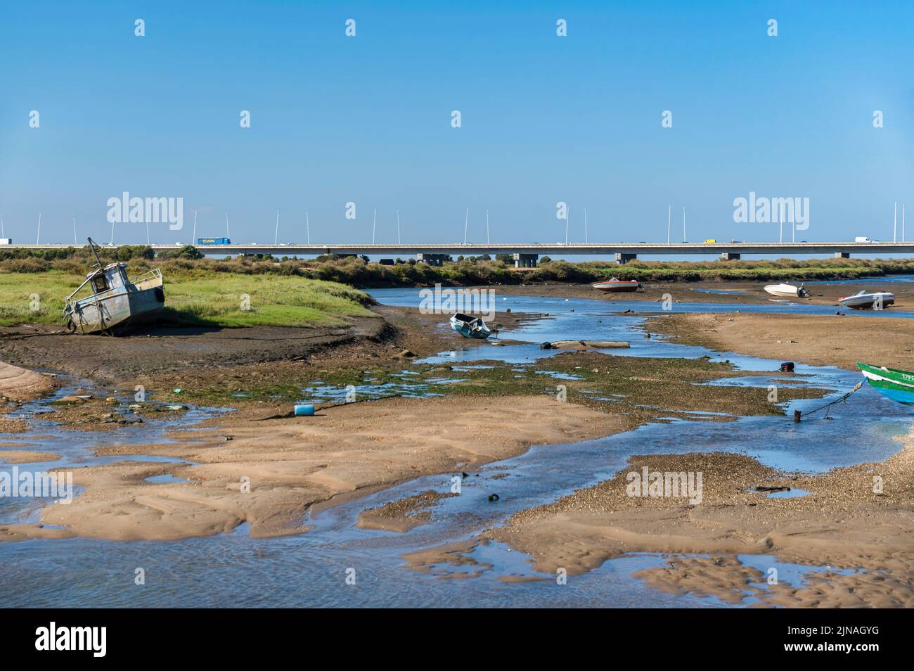 Old pier in Samouco beach in Alcochete Portugal Stock Photo - Alamy