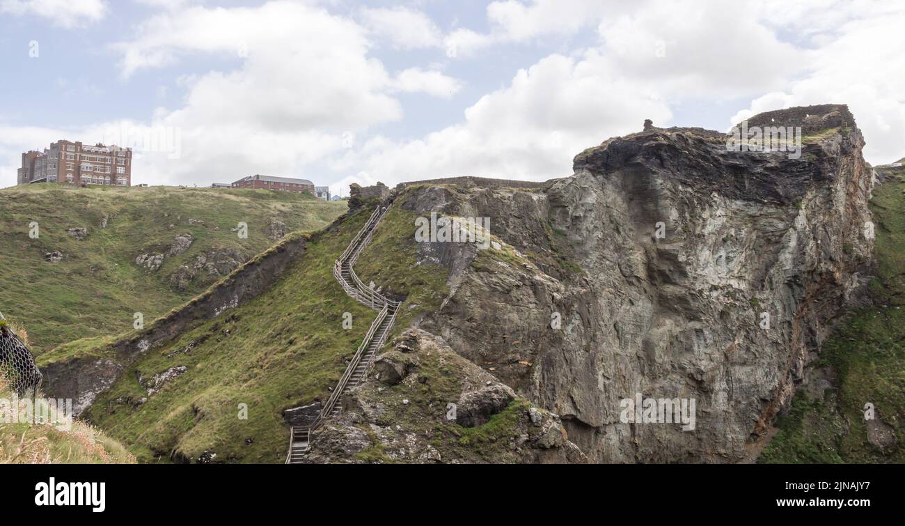 Scenic steep cliffs of Tintagel Castle on a cloudy day, Cornwall, UK ...