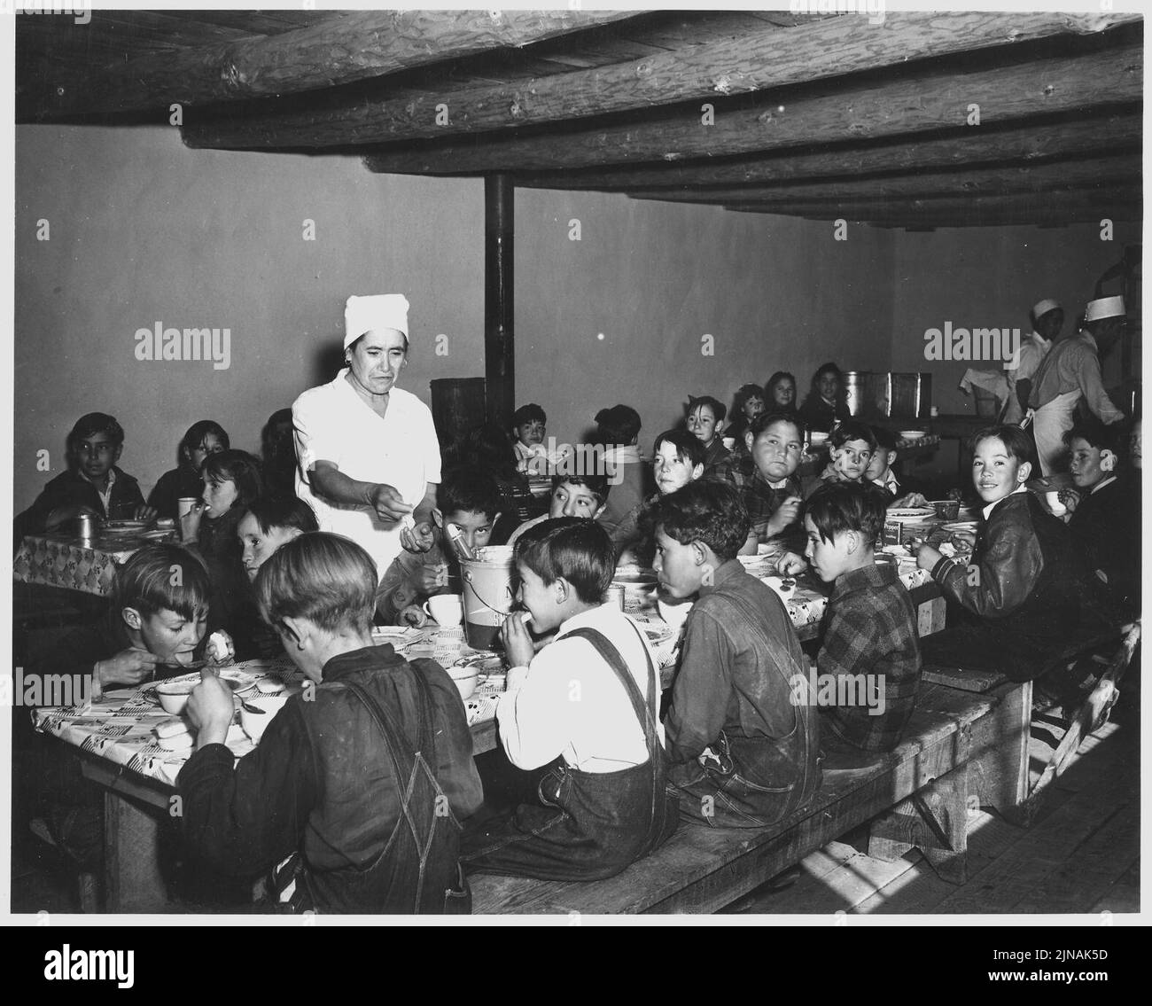 Taos County, New Mexico. The hot lunch, school at Penasco. Children pay ...