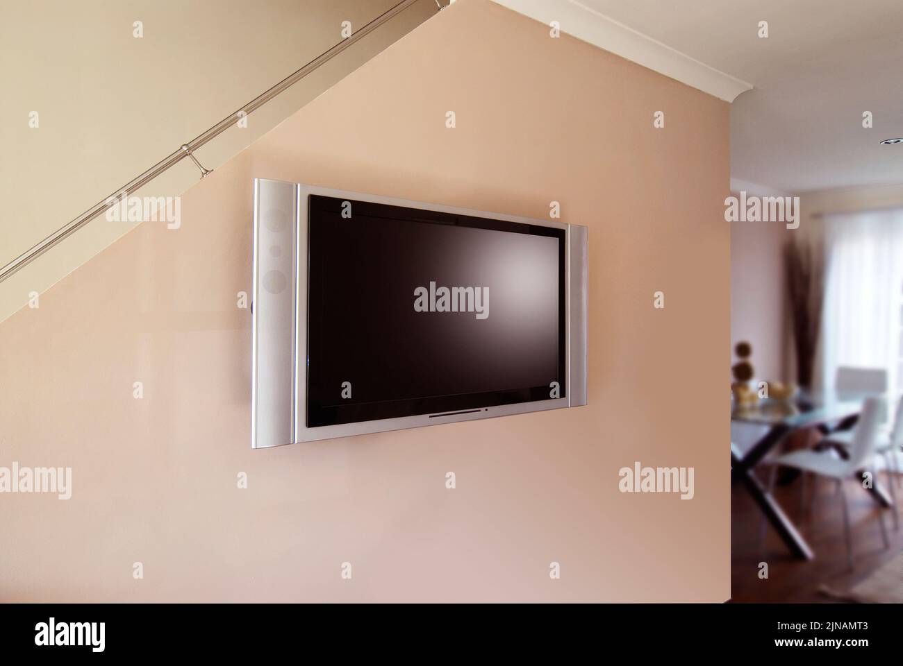 Wall mounted LCD or Plasma flatscreen Television in home lounge Stock ...