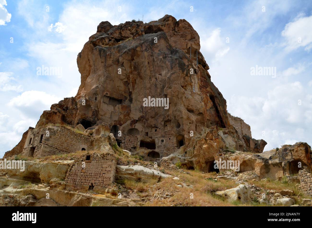 big rock with caves in the village Ortahisar, cappadocia turkey Stock ...