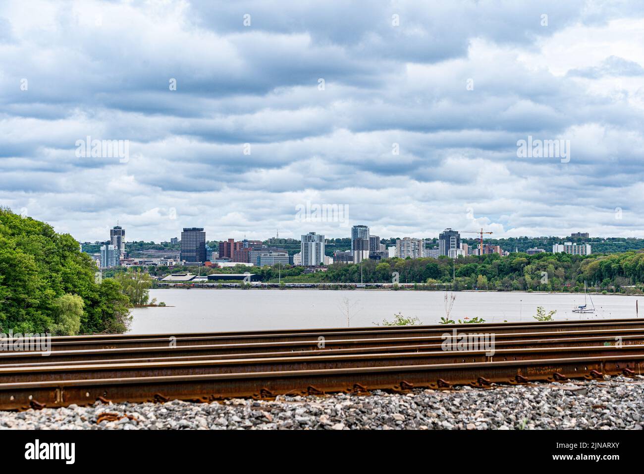 The Hamilton City view from the Burlington rail tracks on a cloudy day ...