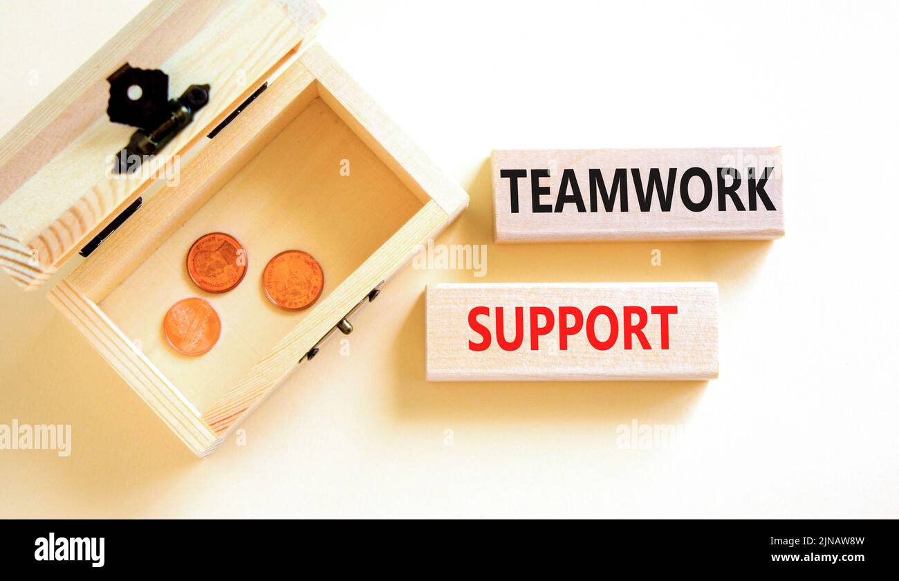 Teamwork support symbol. Concept words Teamwork support on wooden ...