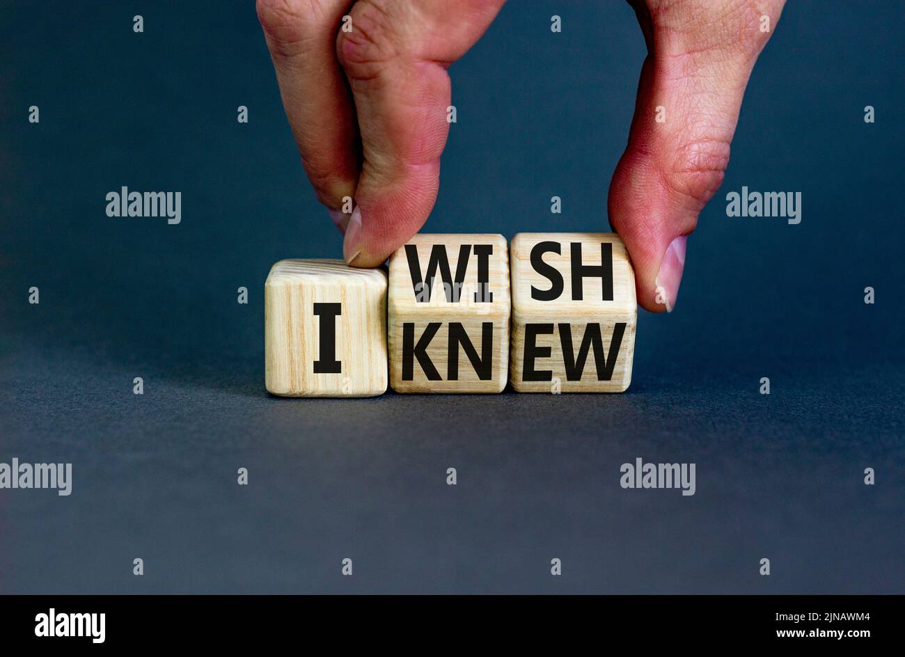 I knew or wish symbol. Concept words I knew and I wish on wooden cubes ...