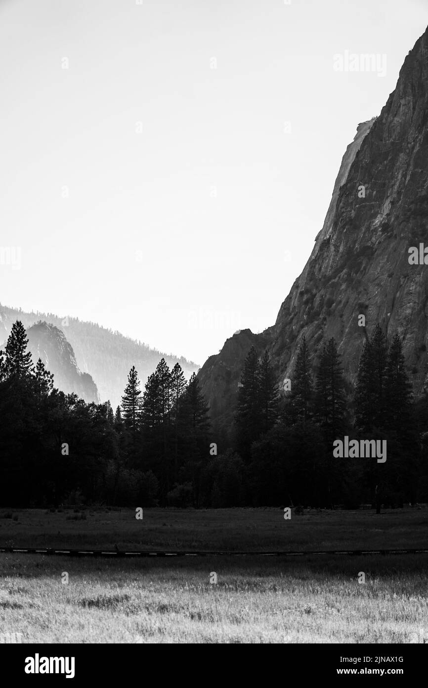 Beautiful vertical view of mountains and hills with forest and valley ...
