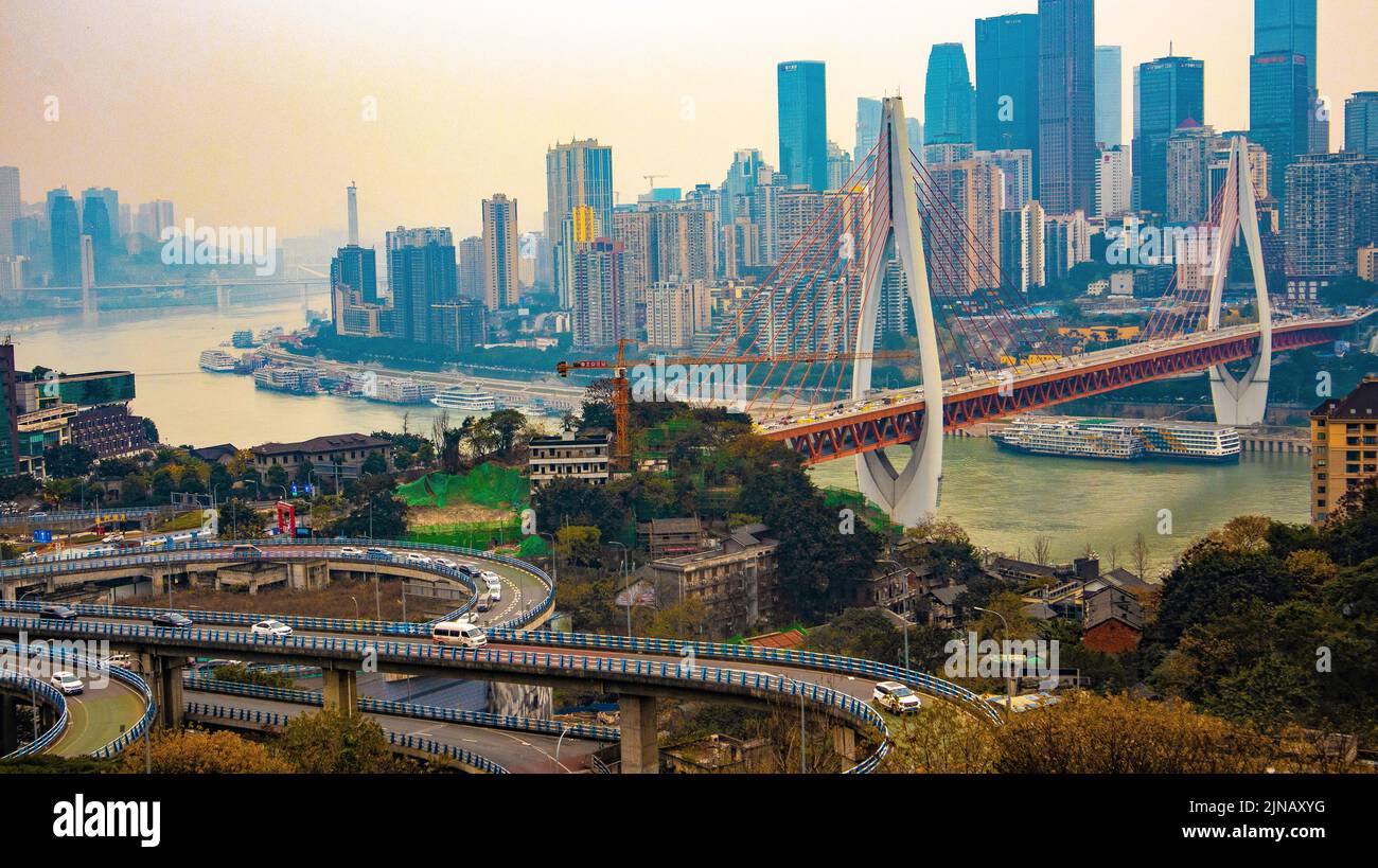 An aerial view of complex Twin River Bridges against a cityscape in ...