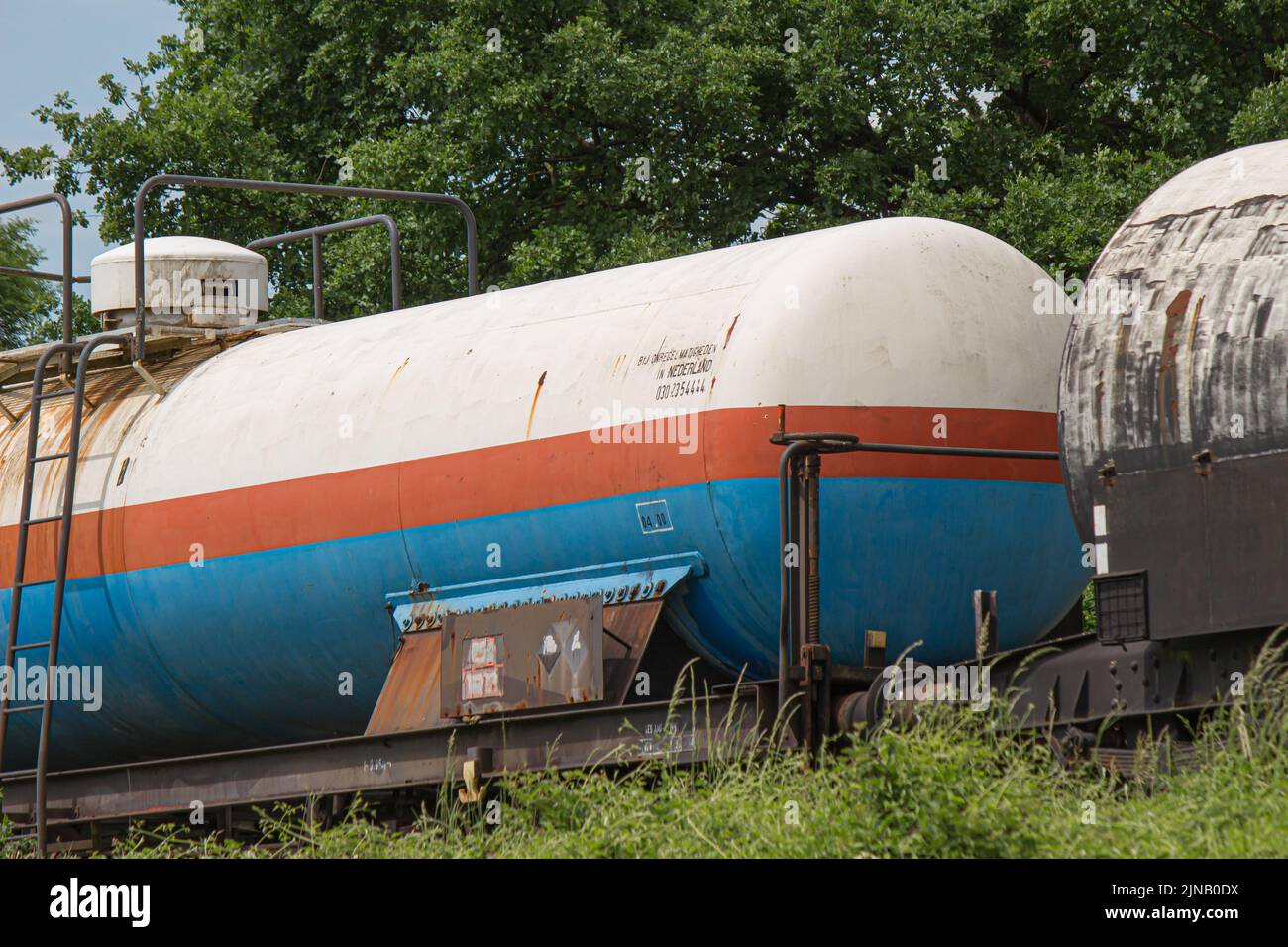 A train barrel on a railway in nature Stock Photo - Alamy