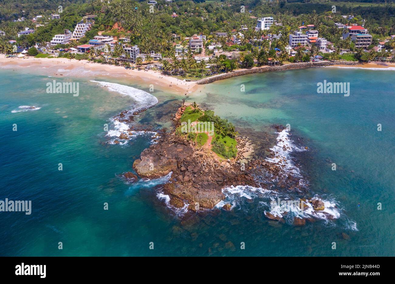 Mirissa sandy Parrot Rock island landmark aerial photo with a beautiful ...