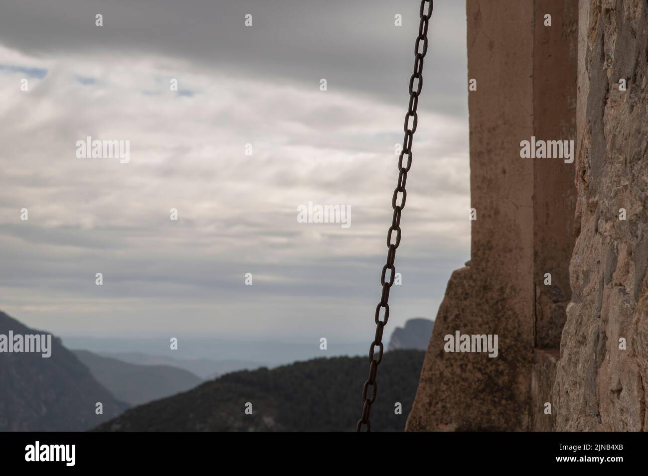 A view of the chain hanging from a mountain Stock Photo - Alamy