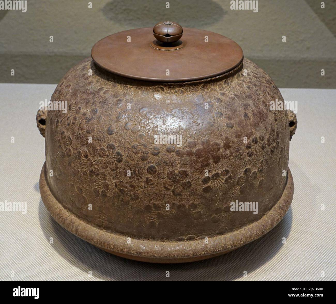 Tea kettle with Japanese kerria design, Ashiya ware, Shinnari type ...