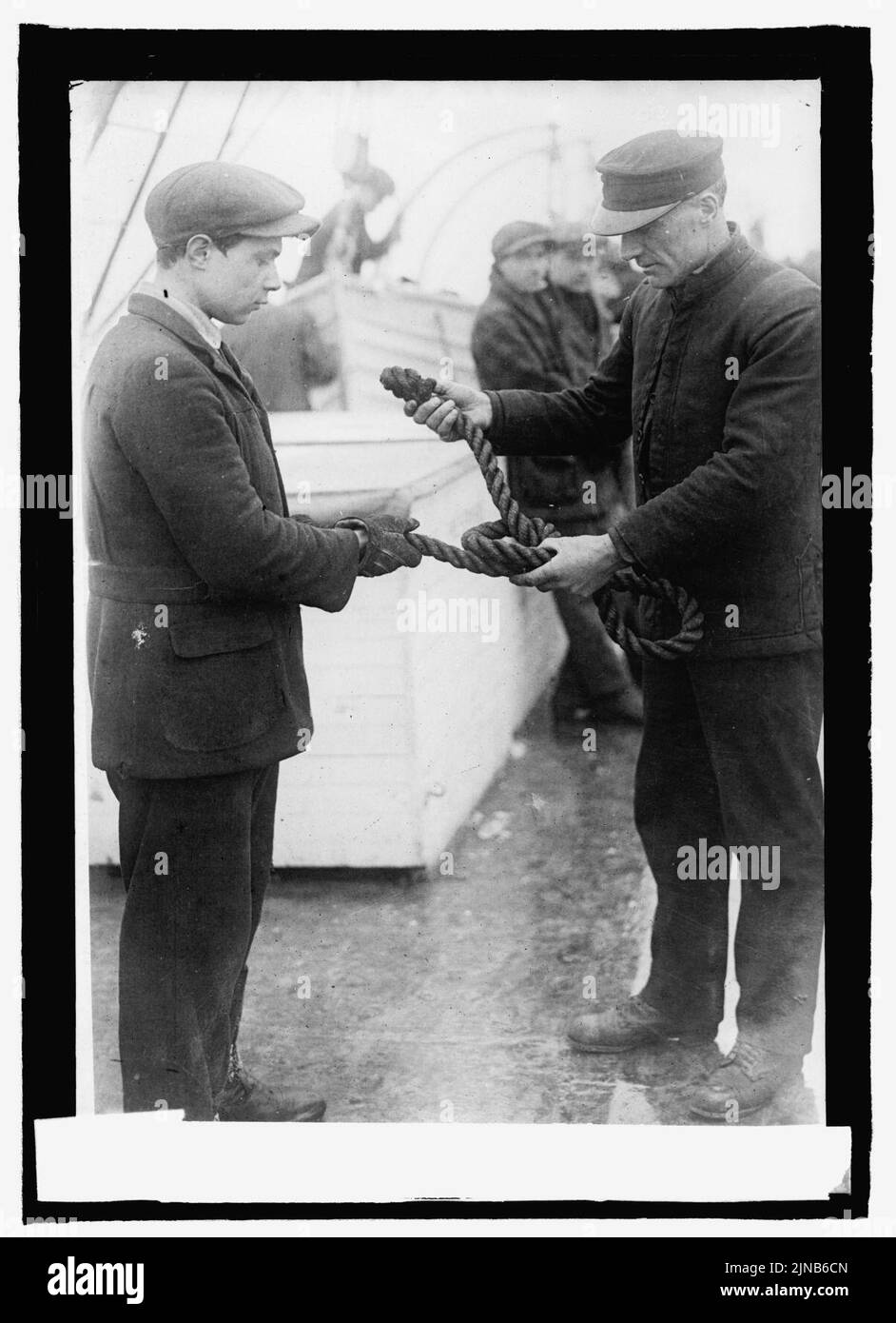 Teaching seamen to tie knots, U.S.S. Calvin Austin Stock Photo - Alamy