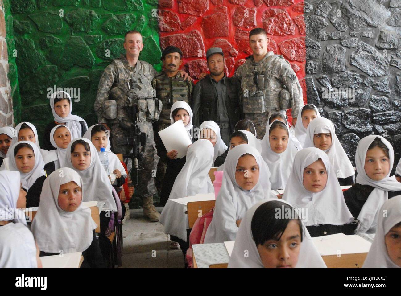 Team Soldiering on After Tragic Loss Stock Photo - Alamy