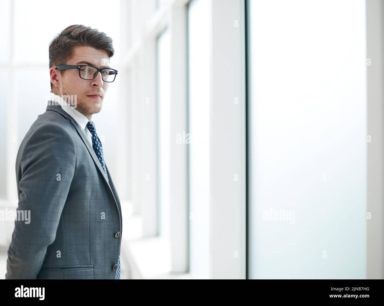 young business man modern office Stock Photo - Alamy